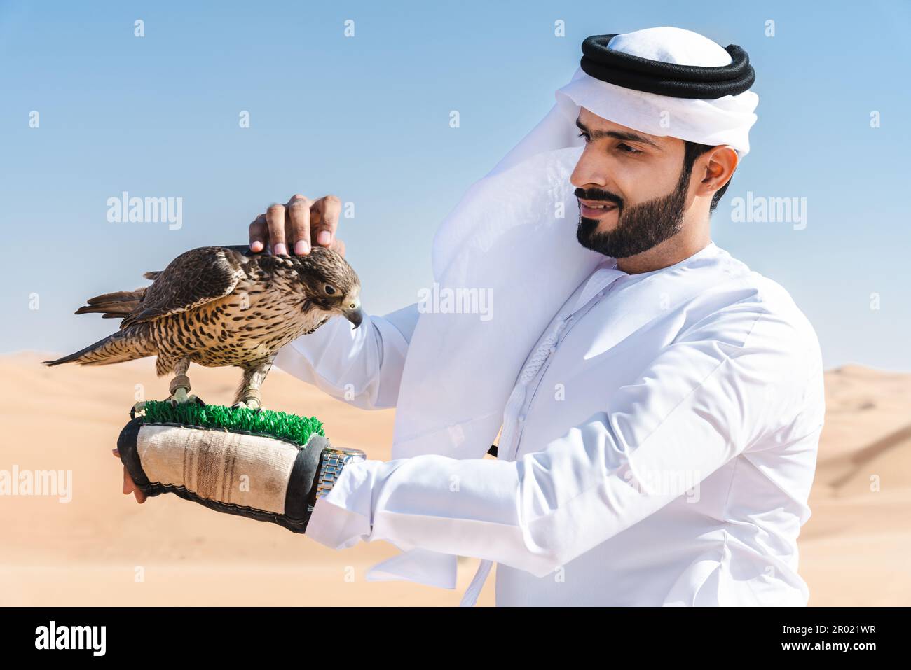 Middle-eastern man wearing traditional emirati arab kandura in the ...