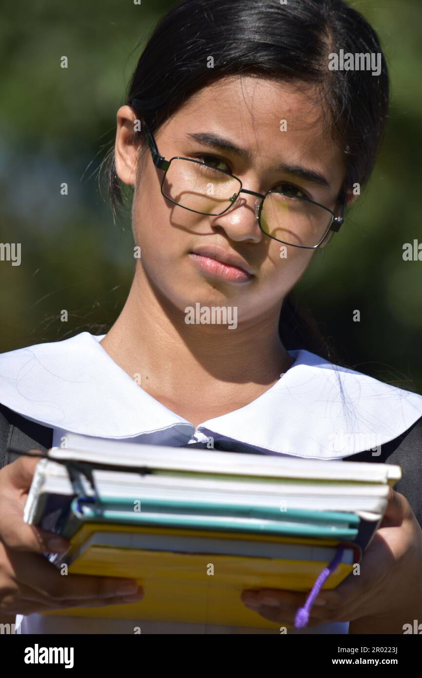Girl Student And Confusion With School Books Stock Photo - Alamy