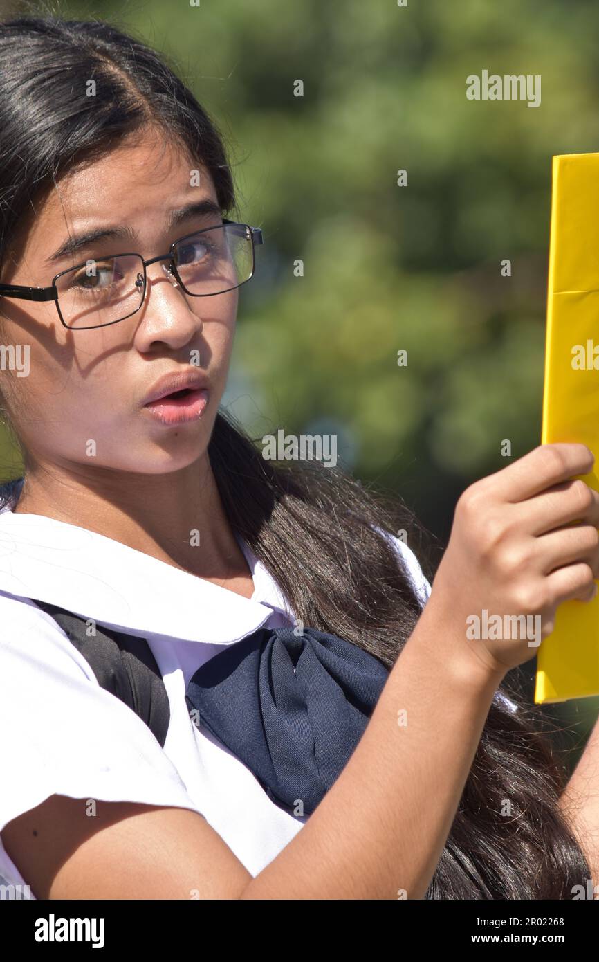 Intelligent Female Student Reading Wearing Glasses Stock Photo - Alamy