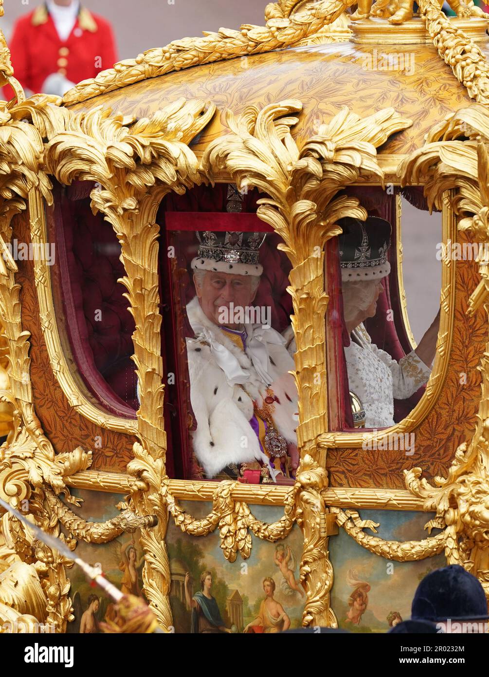 King Charles III and Queen Camilla are carried in the Gold State Coach ...