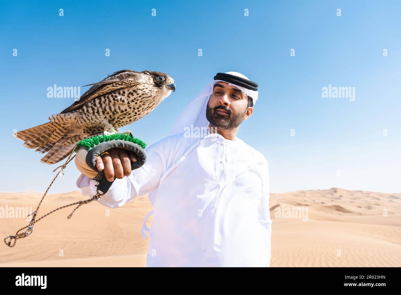 Middle-eastern man wearing traditional emirati arab kandura in the ...