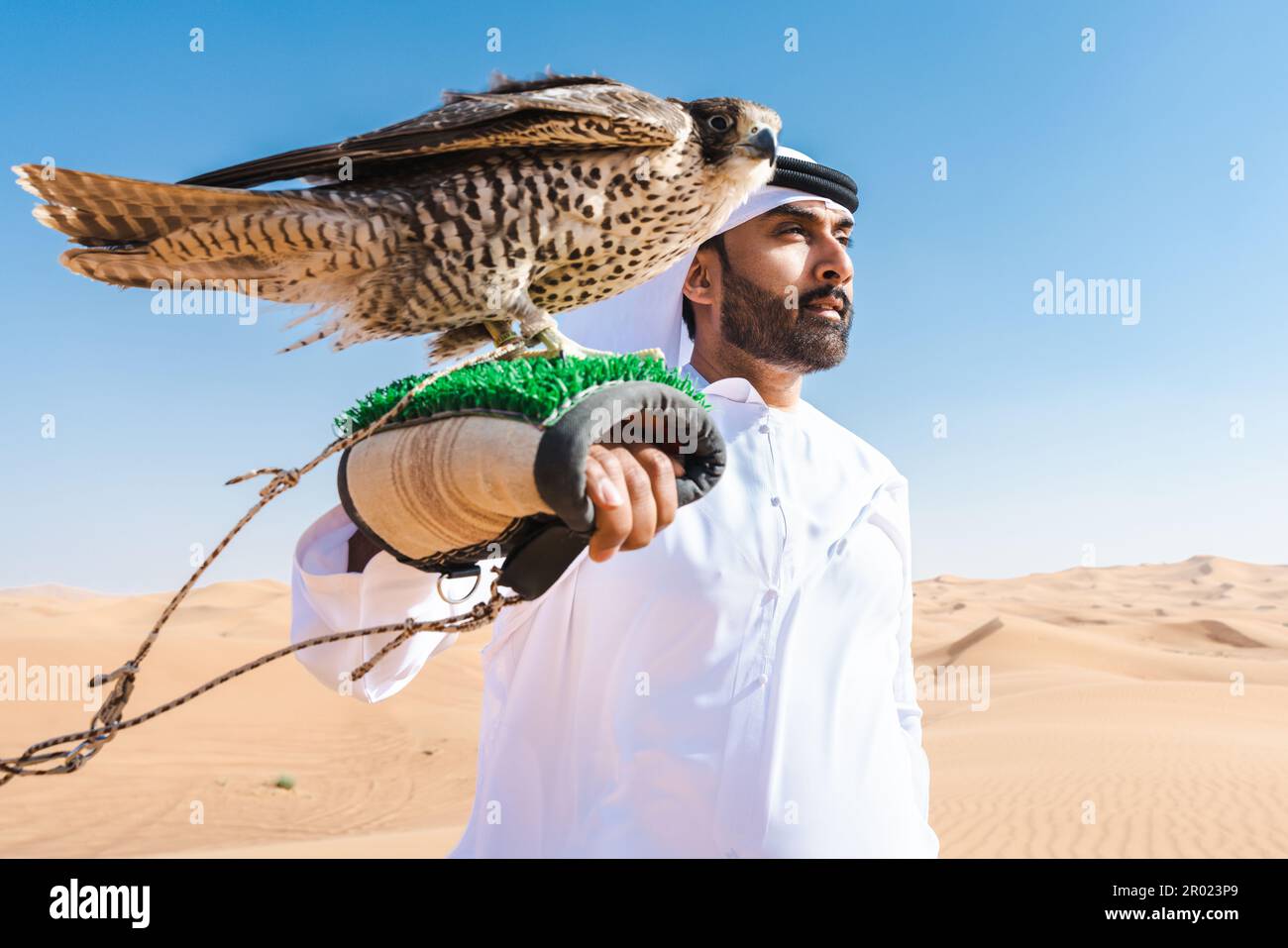 Middle-eastern man wearing traditional emirati arab kandura in the ...