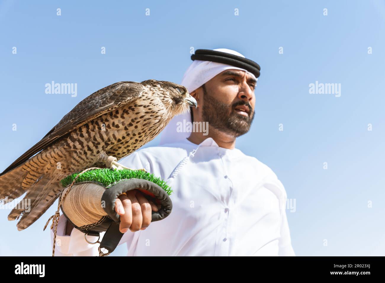 Middle-eastern man wearing traditional emirati arab kandura in the ...