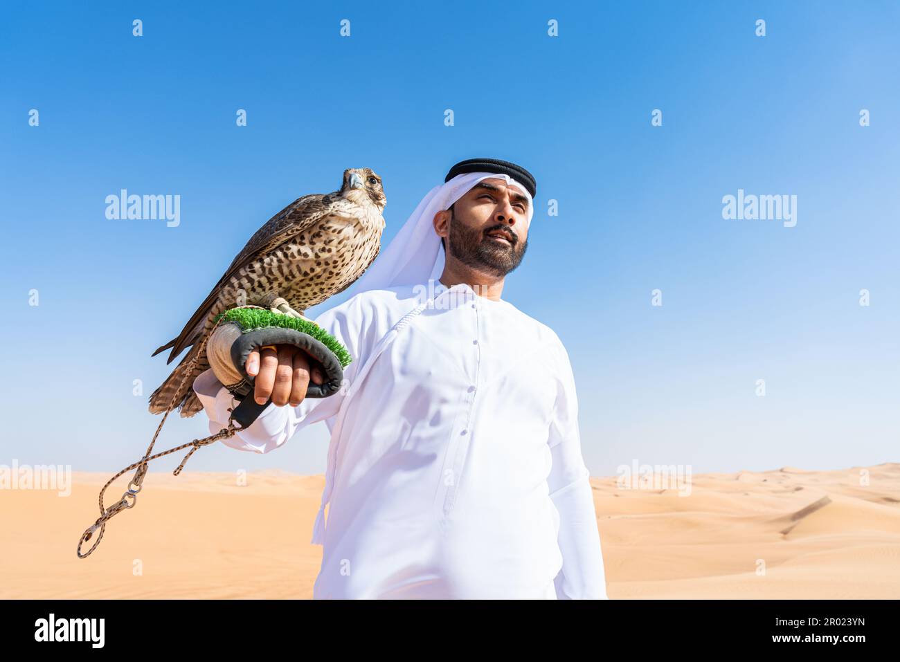 Middle-eastern man wearing traditional emirati arab kandura in the ...