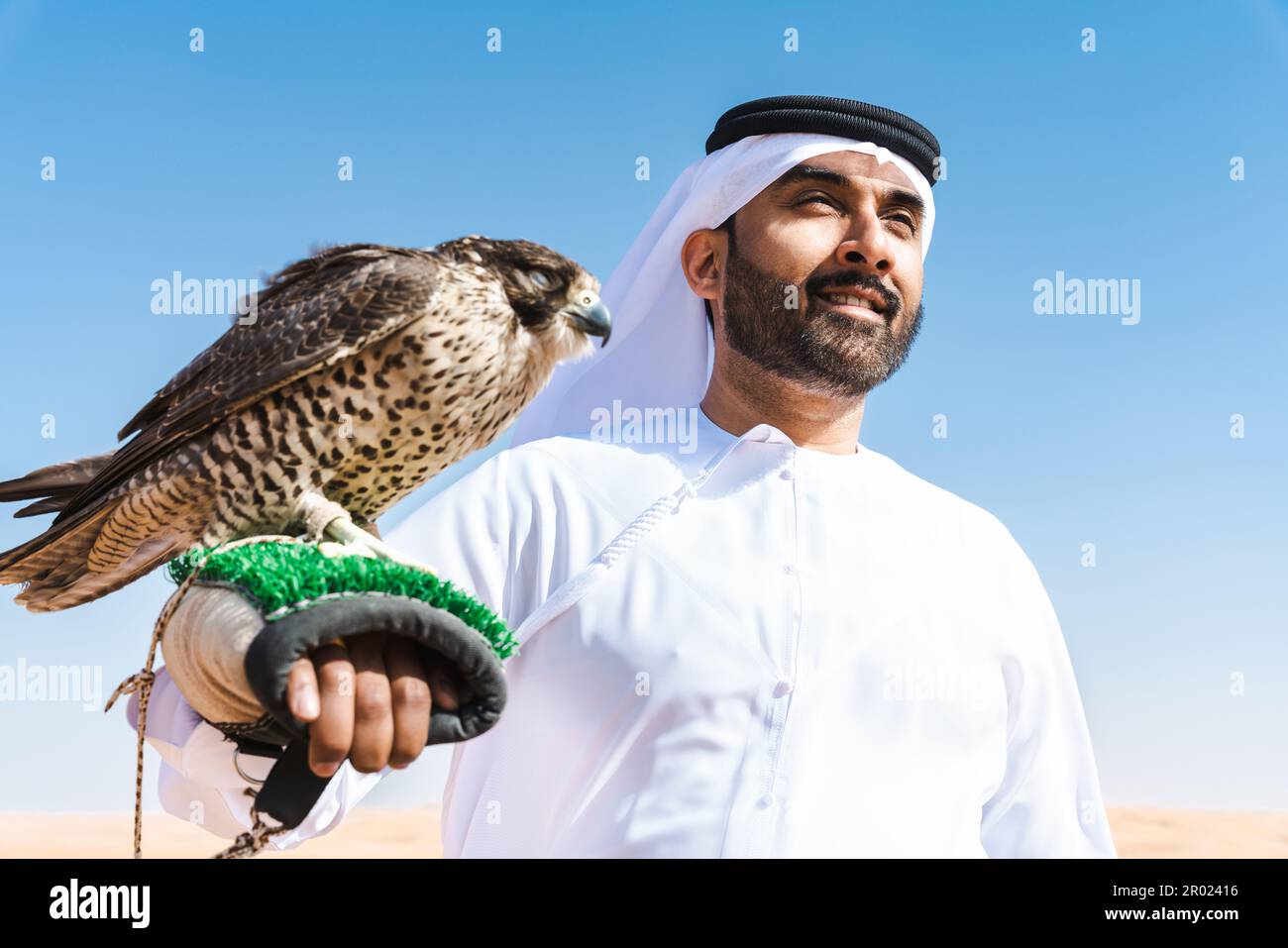 Middle-eastern man wearing traditional emirati arab kandura in the ...