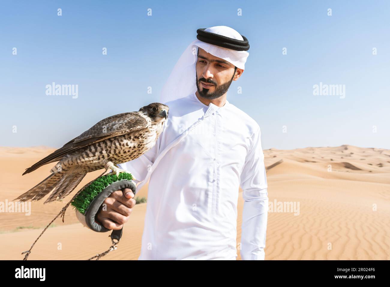 Middle-eastern man wearing traditional emirati arab kandura in the ...