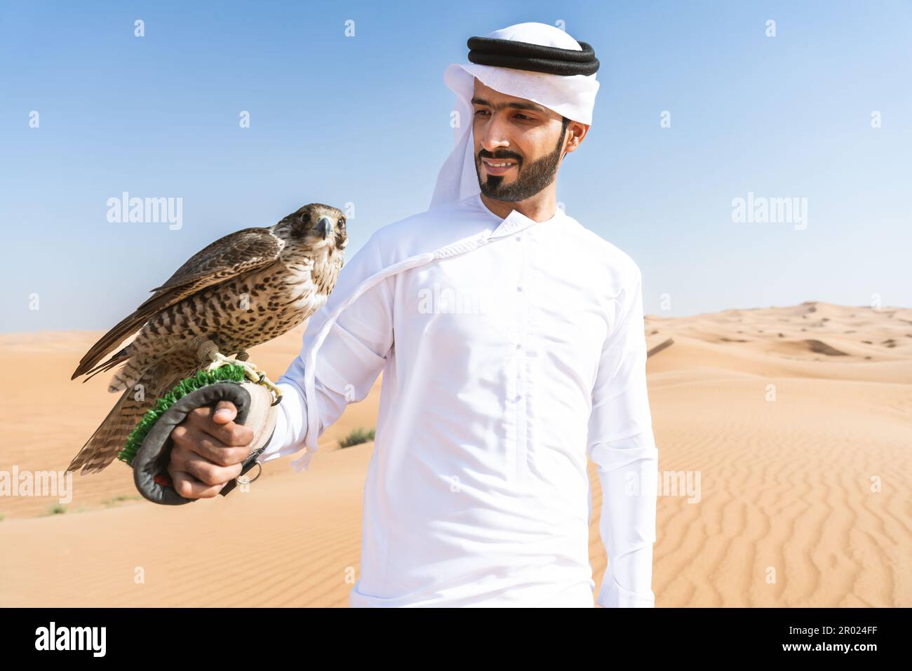 Middle-eastern man wearing traditional emirati arab kandura in the ...