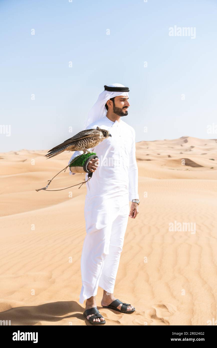 Middle-eastern man wearing traditional emirati arab kandura in the ...