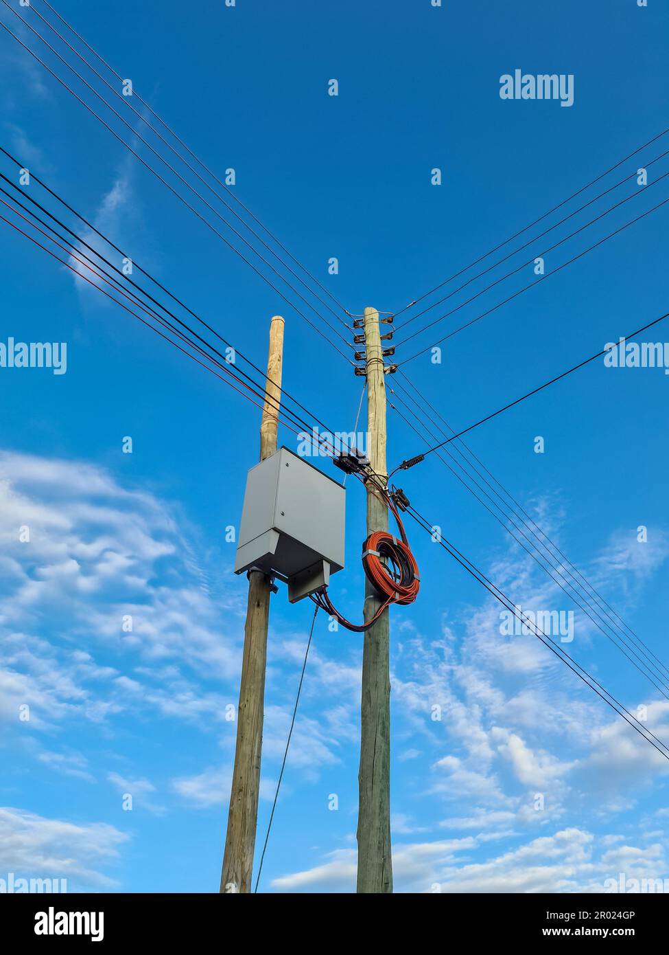 Wildly attached power cables to a power pole Stock Photo - Alamy
