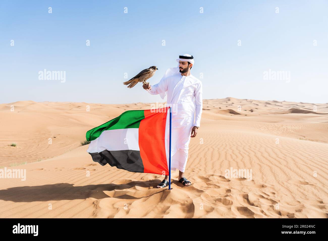 Middle-eastern man wearing traditional emirati arab kandura in the ...