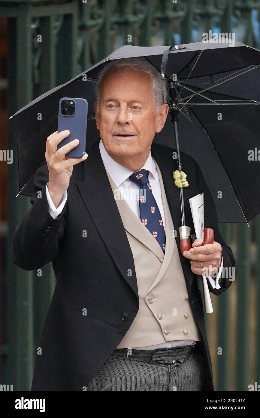 Gyles Brandreth leaves Westminster Abbey following the coronation ...
