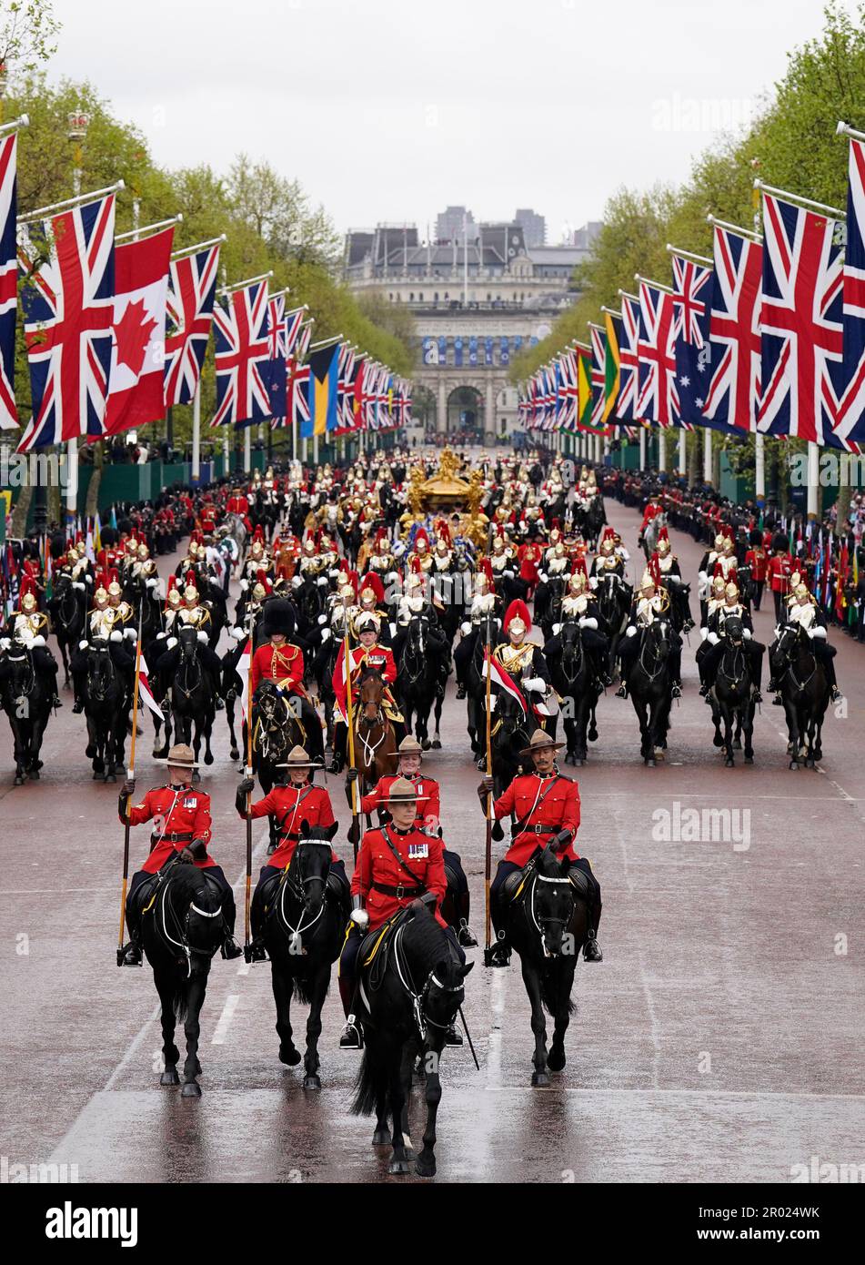 The Coronation Procession travels along The Mall following the ...