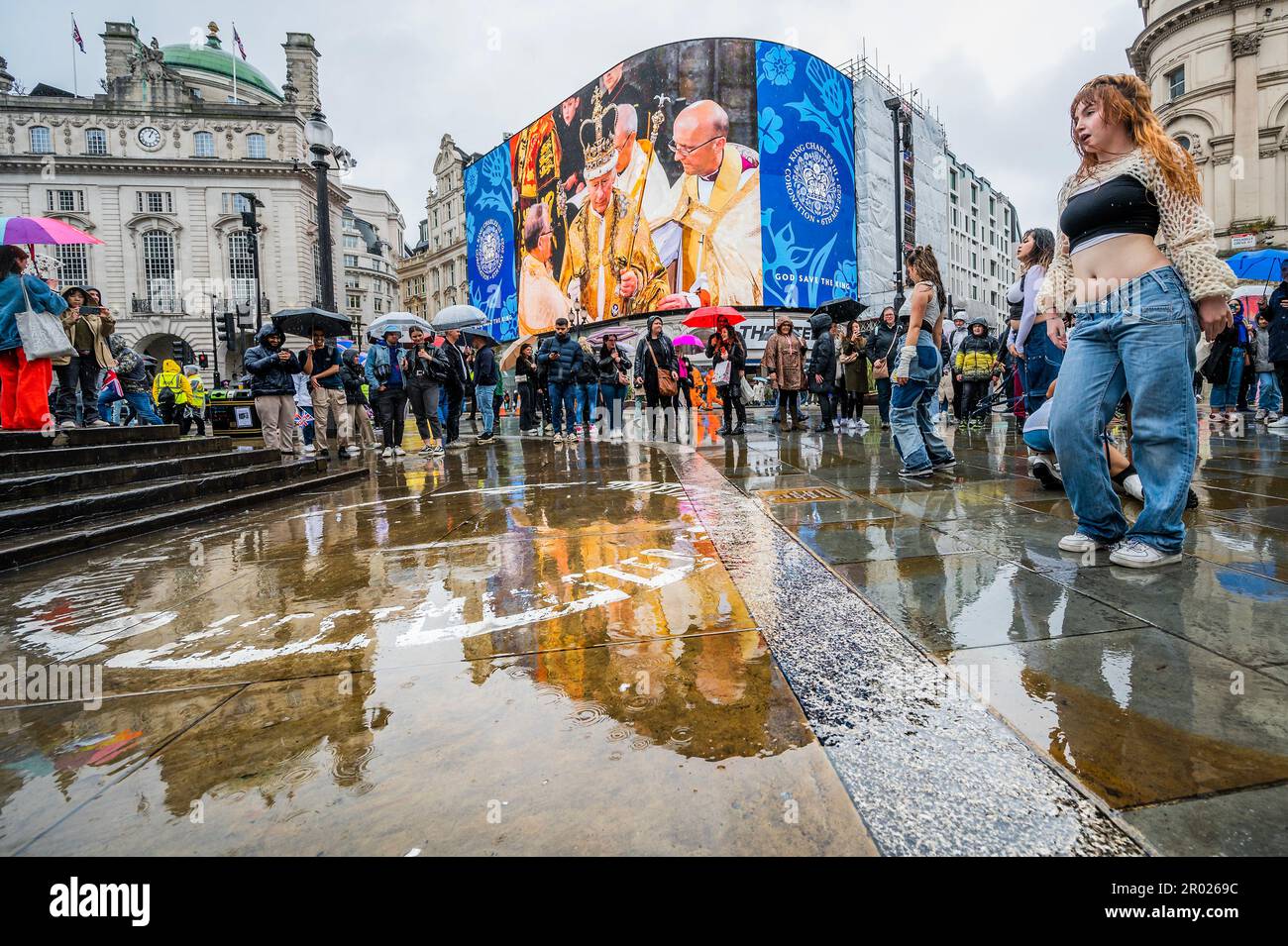 London, UK. 6th May, 2023. A dance troop strangely chooses this day to ...