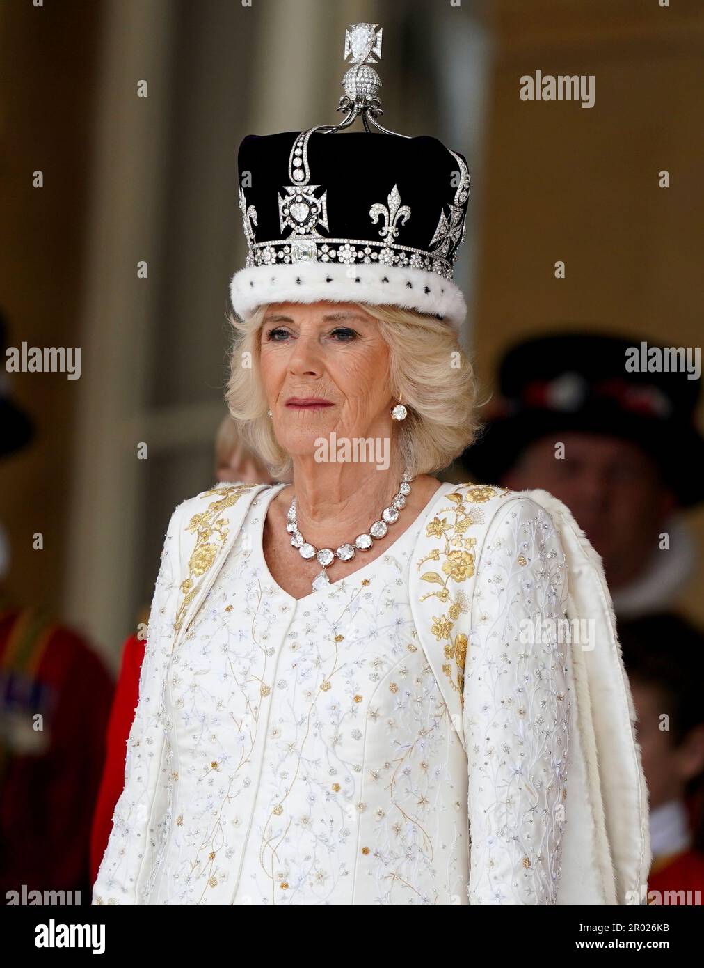 Queen Camilla receives a royal salute from members of the military in ...