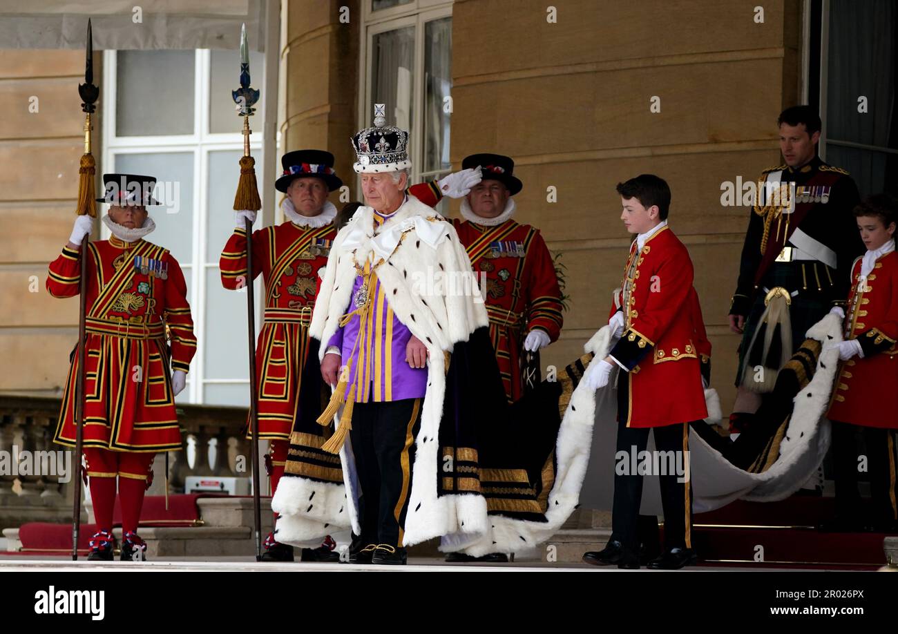 King Charles III receives a royal salute from members of the military ...