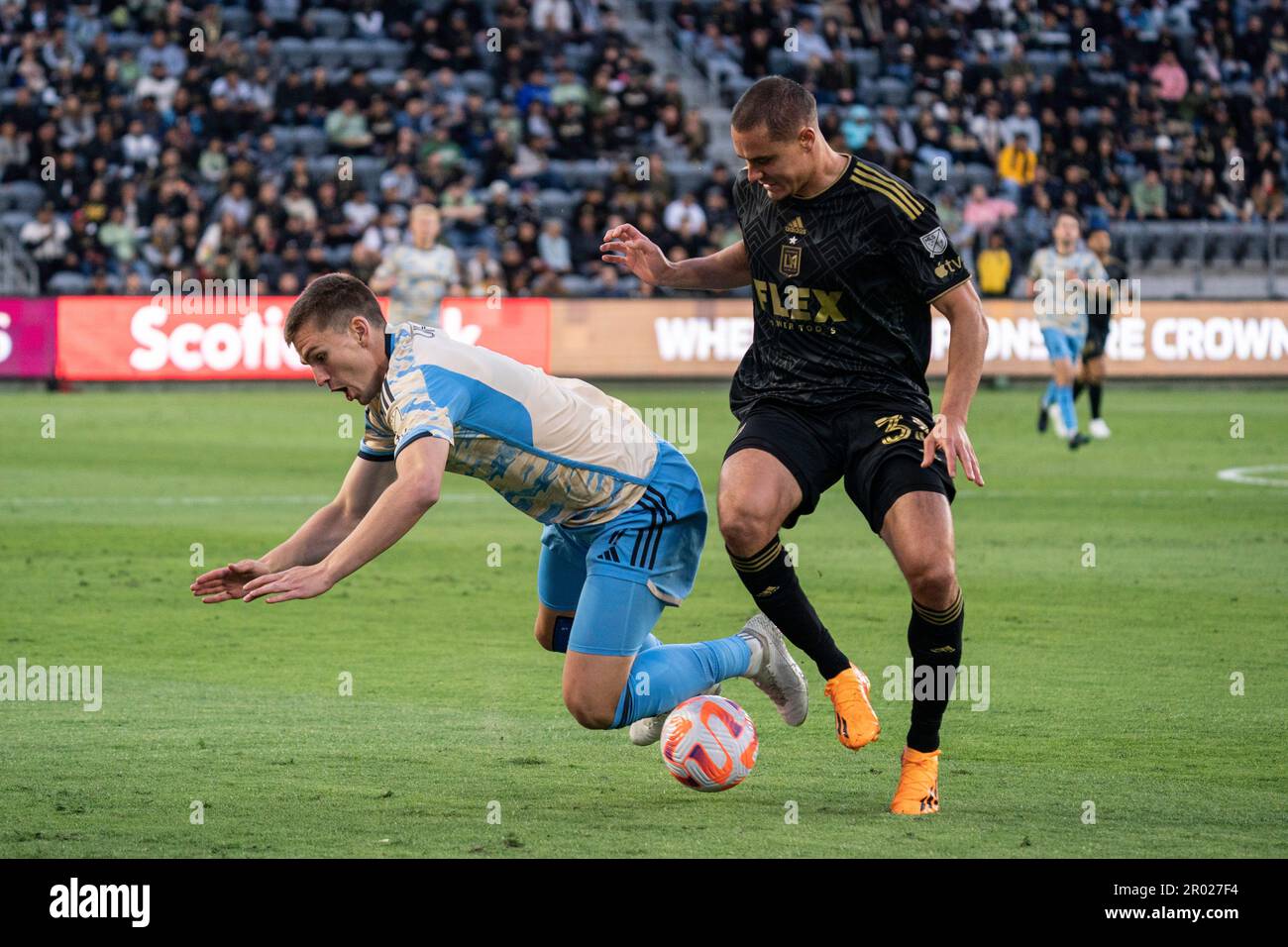 Philadelphia Union forward Mikael Uhre (7) and LAFC defender Aaron Long ...