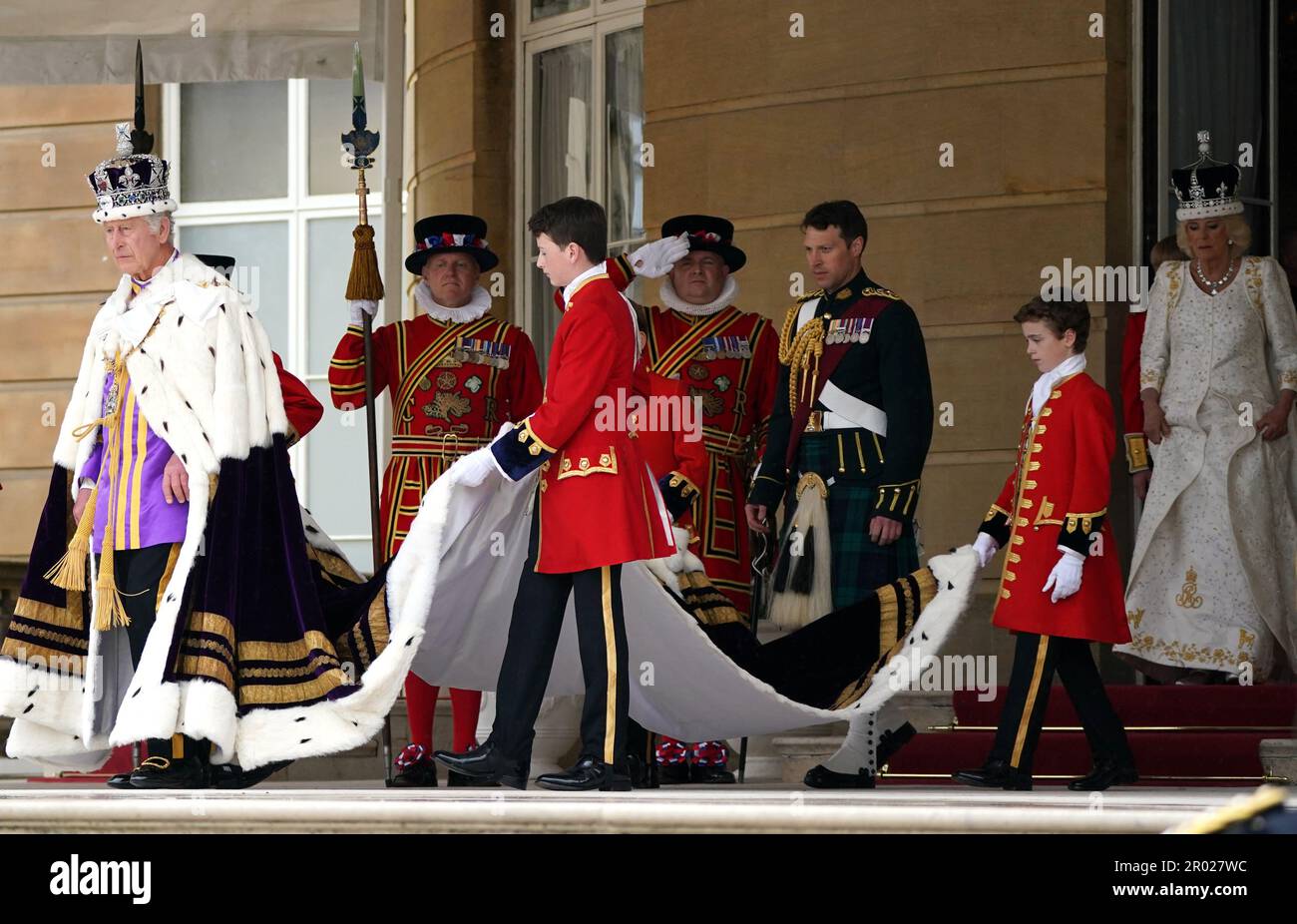 King Charles III receives a royal salute from members of the military ...