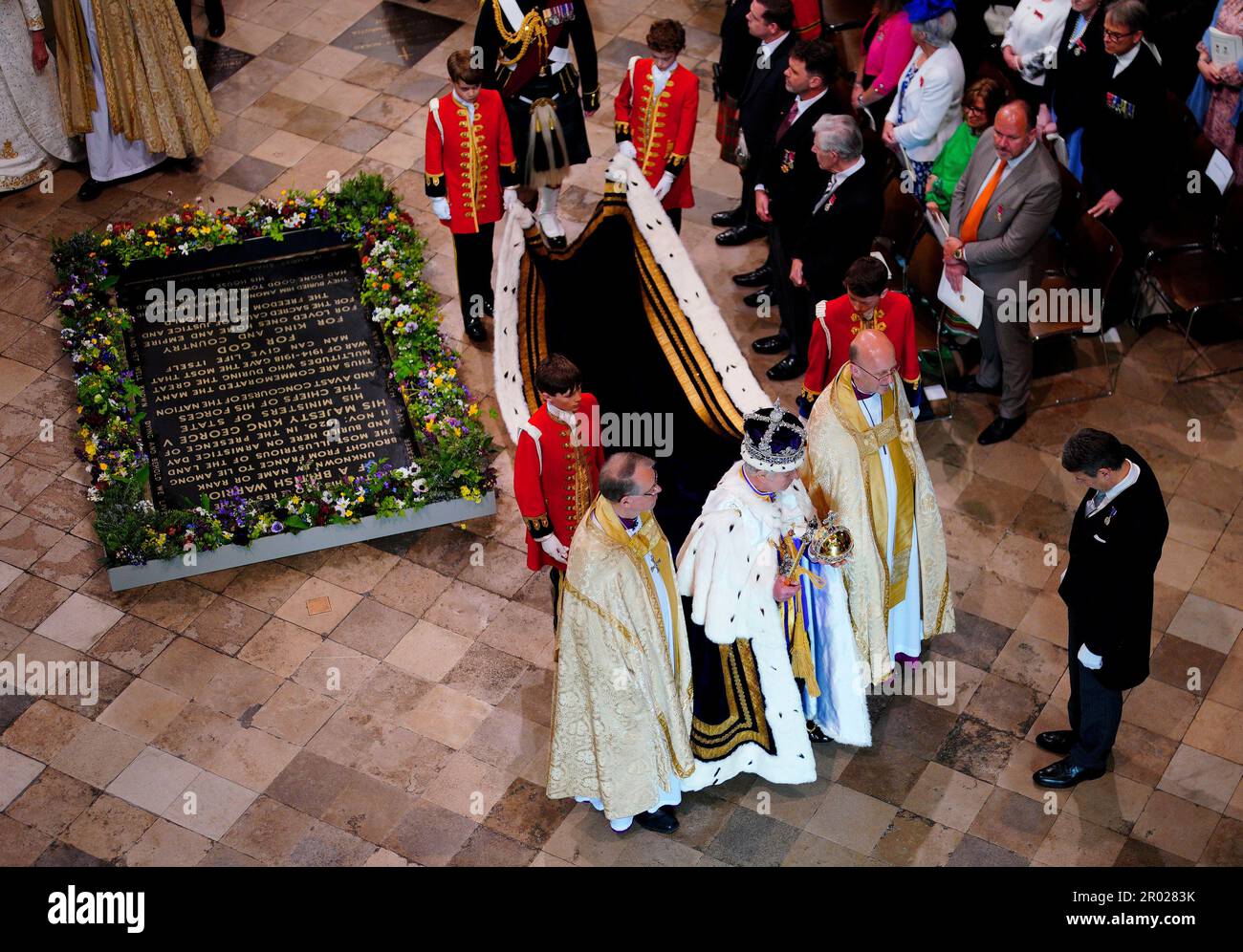 King Charles III, wearing the Imperial State Crown, leaves Westminster ...