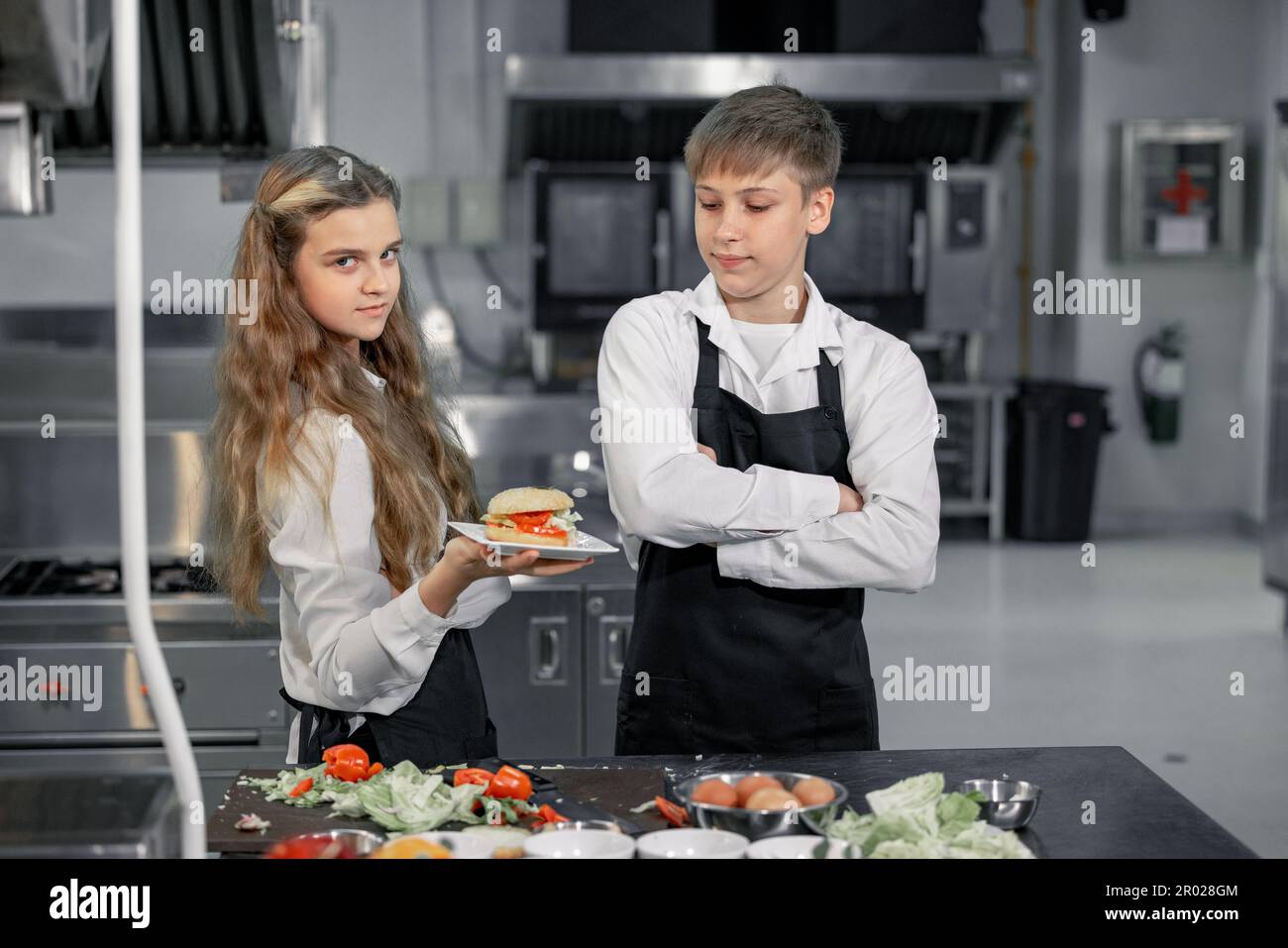 Teenagers learn from expert chefs at culinary school to prepare ...