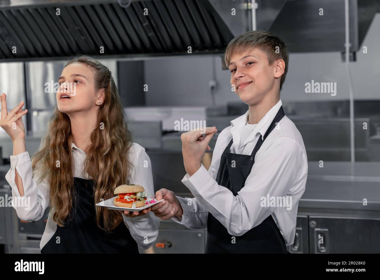 Teenagers learn from expert chefs at culinary school to prepare ...