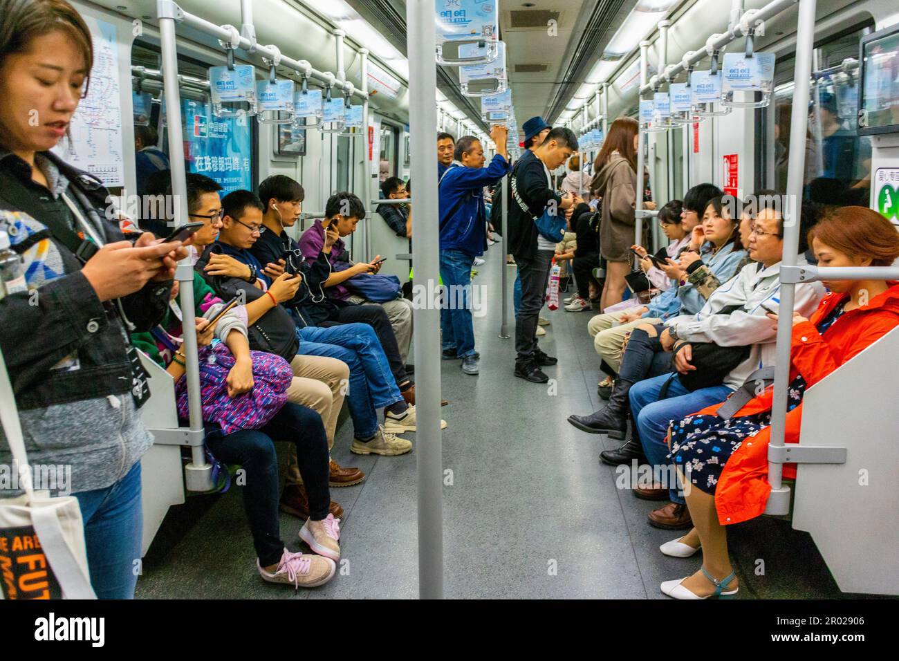 Shanghai, China, Crowded Metro Subway Train, Inside, Chinese Tourists, Riding in Public ...