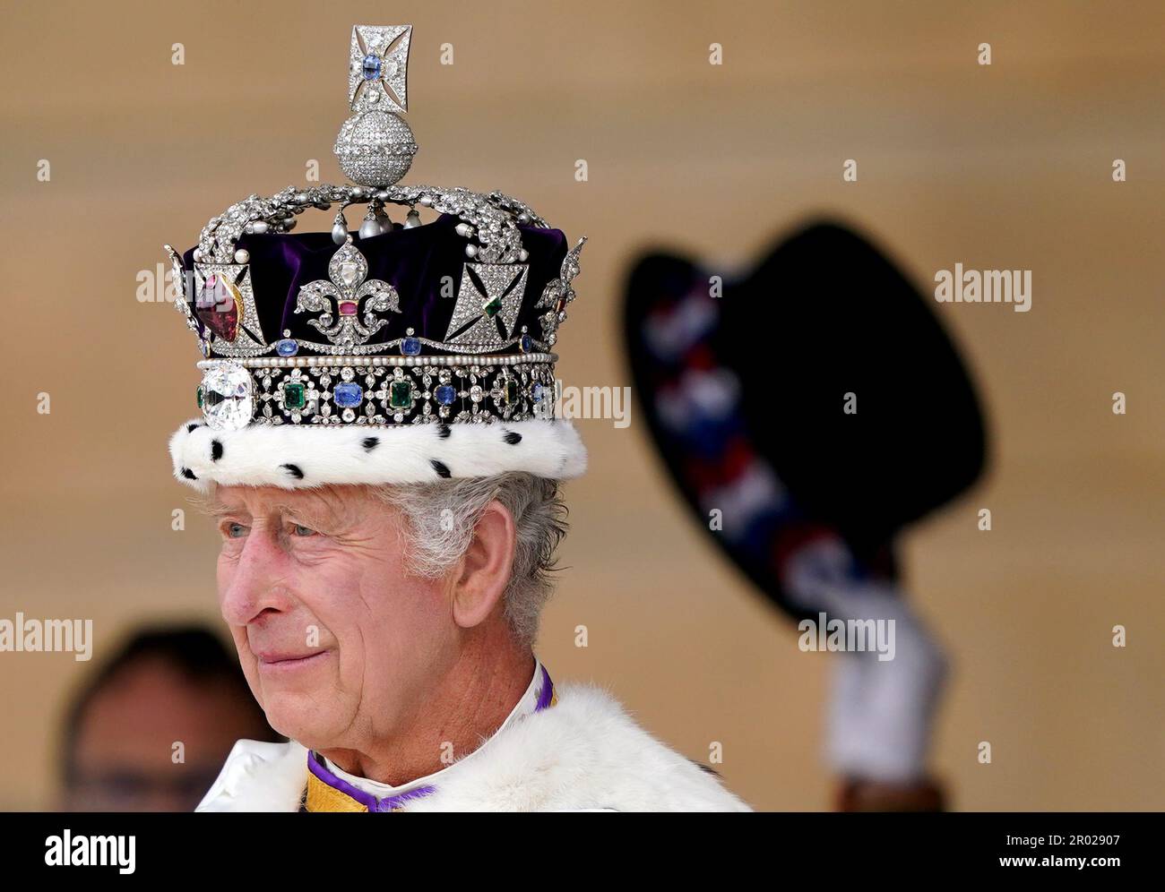 King Charles III receives a royal salute from members of the military ...