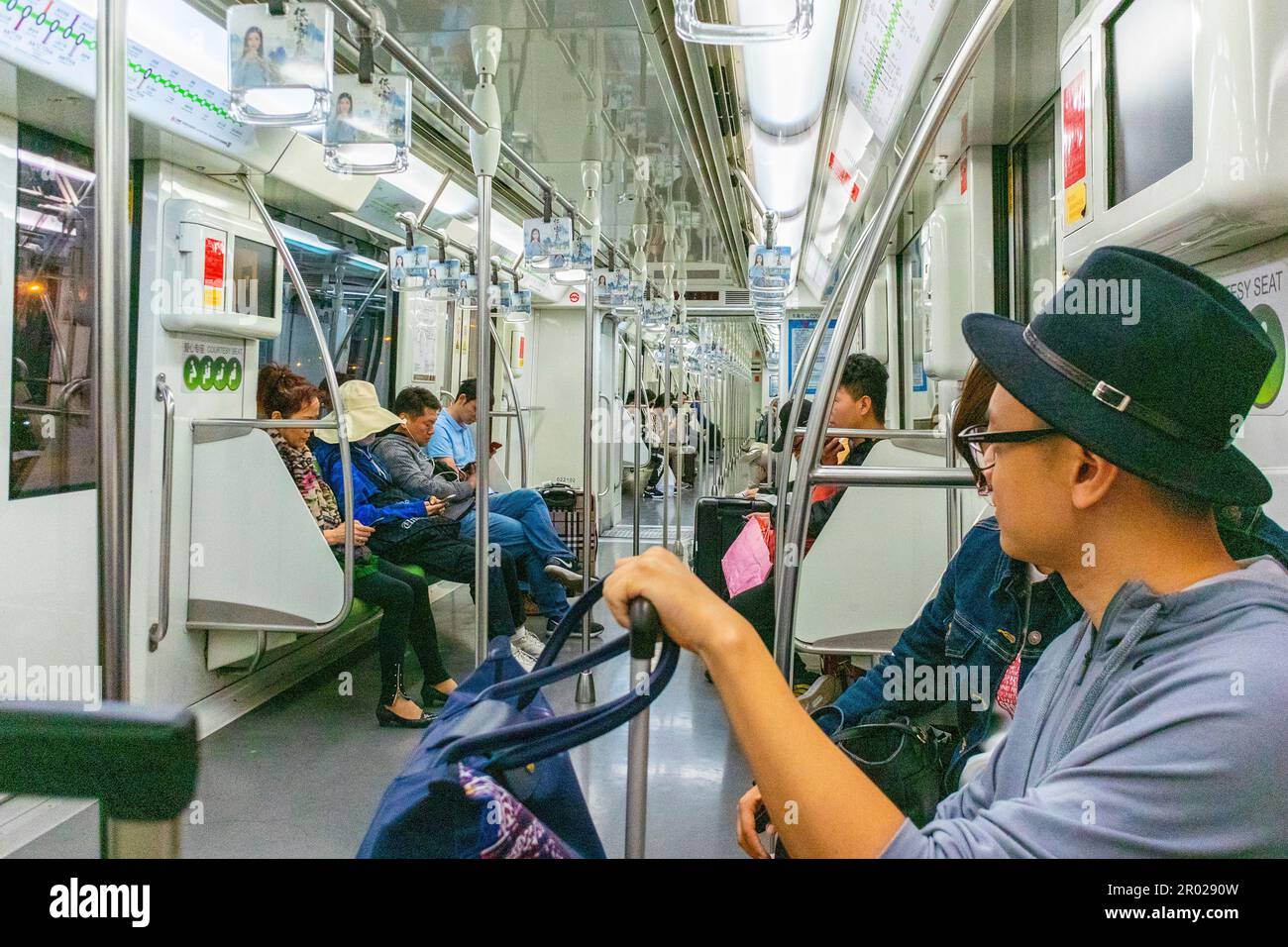 Shanghai China Crowded Metro Subway Train Inside Chinese Tourists