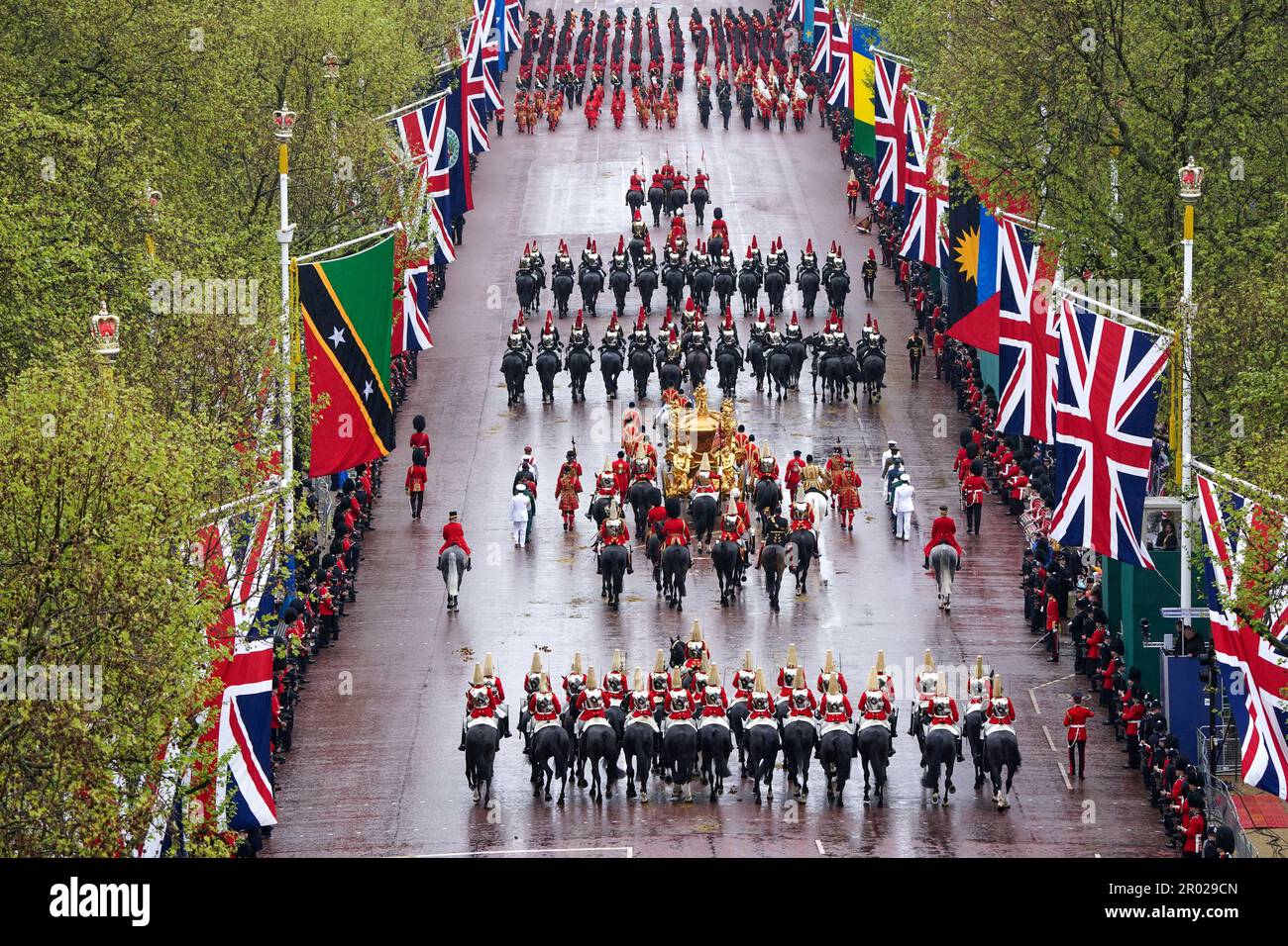 **The Diamond Jubilee State Coach, accompanied by the Sovereign's ...