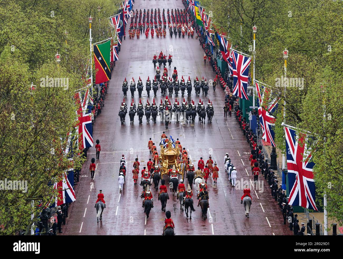 The Coronation Procession travels along The Mall following the ...