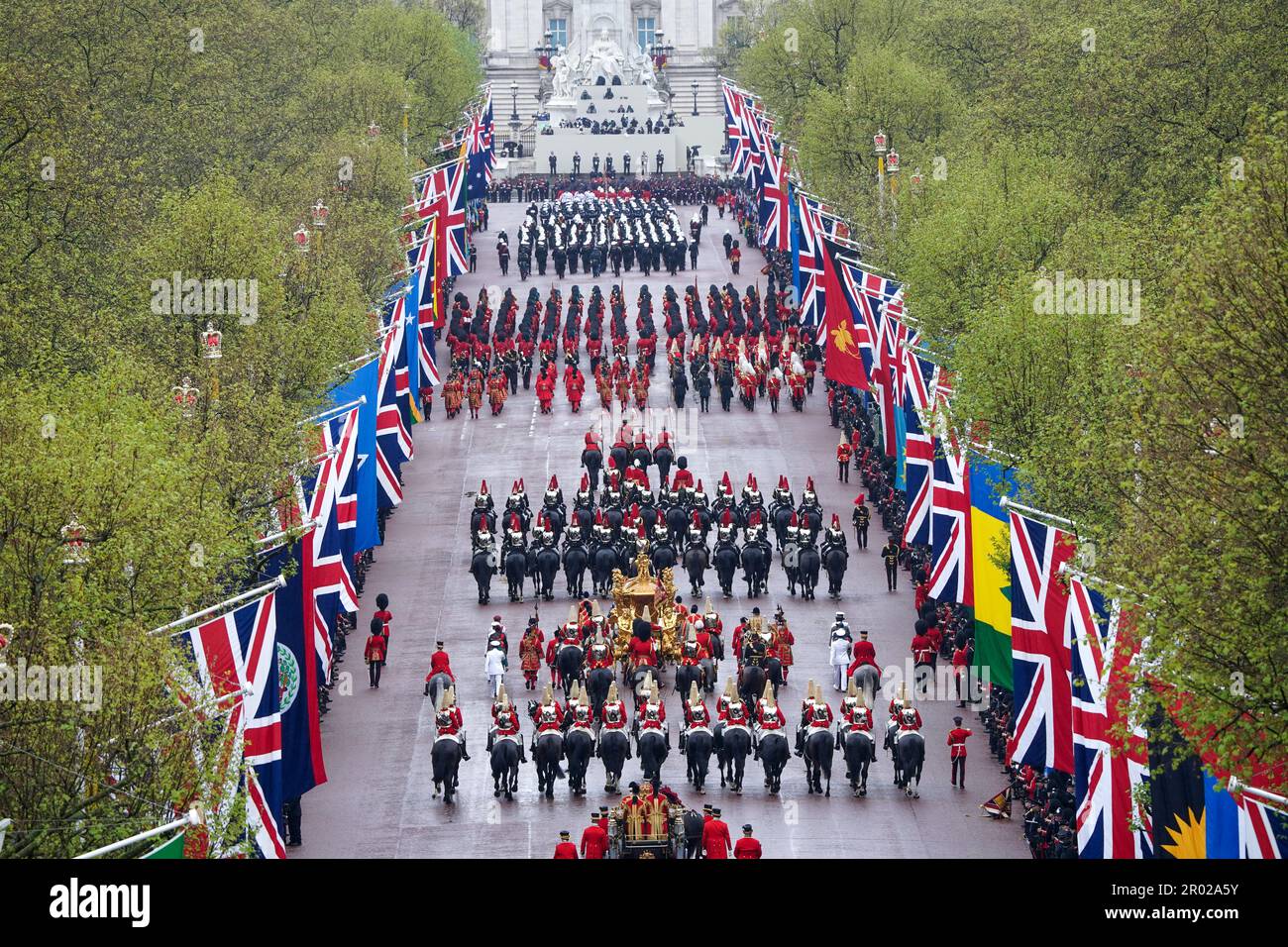The Coronation Procession travels along The Mall following the ...