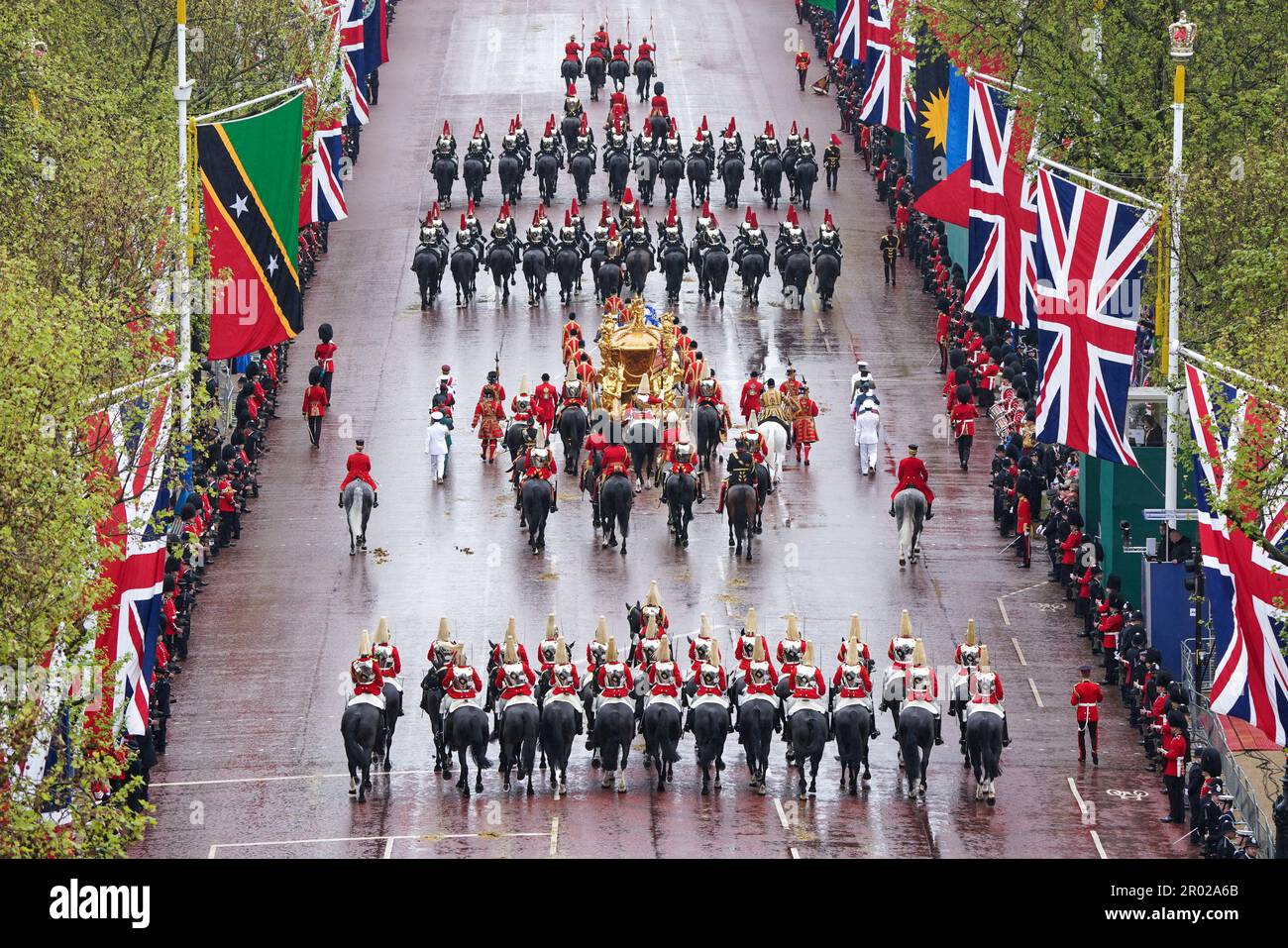 The Coronation Procession travels along The Mall following the ...