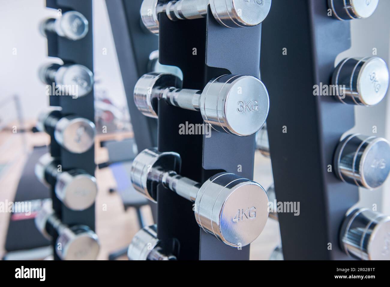 Dumbbells in gym shelf hi-res stock photography and images - Alamy