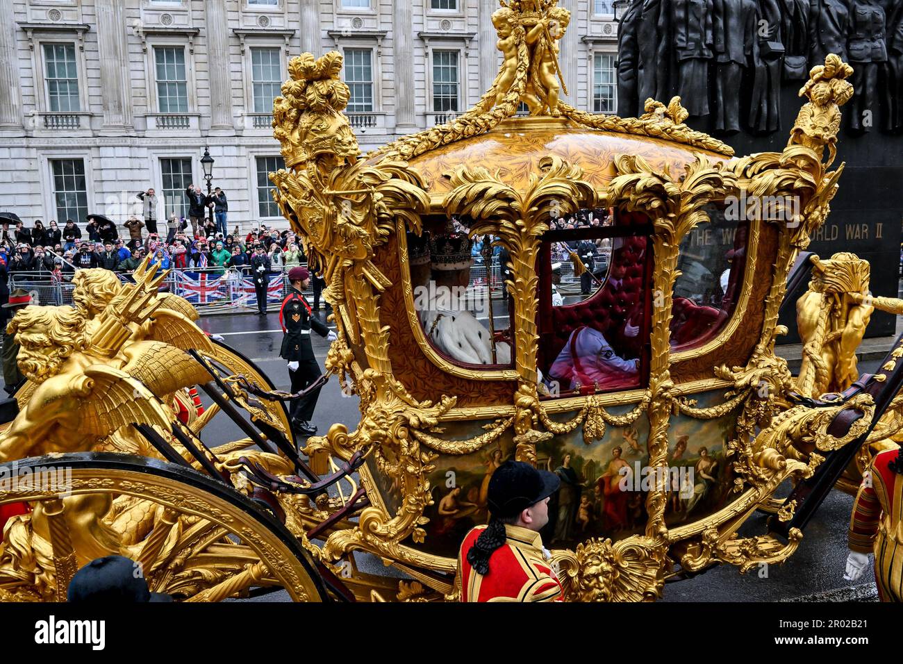 London, UK. 06th May, 2023. King Charles III and Queen Camilla ride in ...