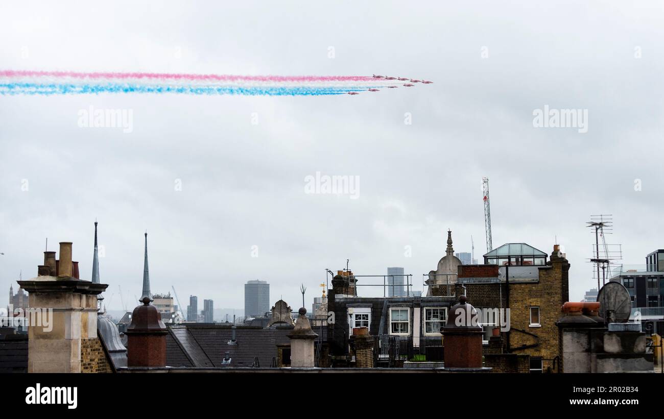 London, UK. 6 May 2023. The Red Arrows pass by in a flypast over ...