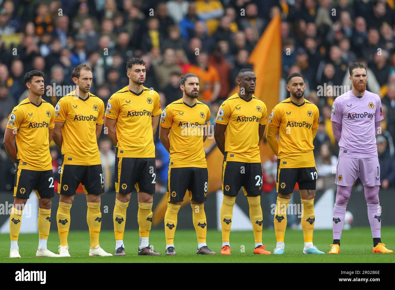 Wolverhampton Wanderers players stay together for the national anthem ...