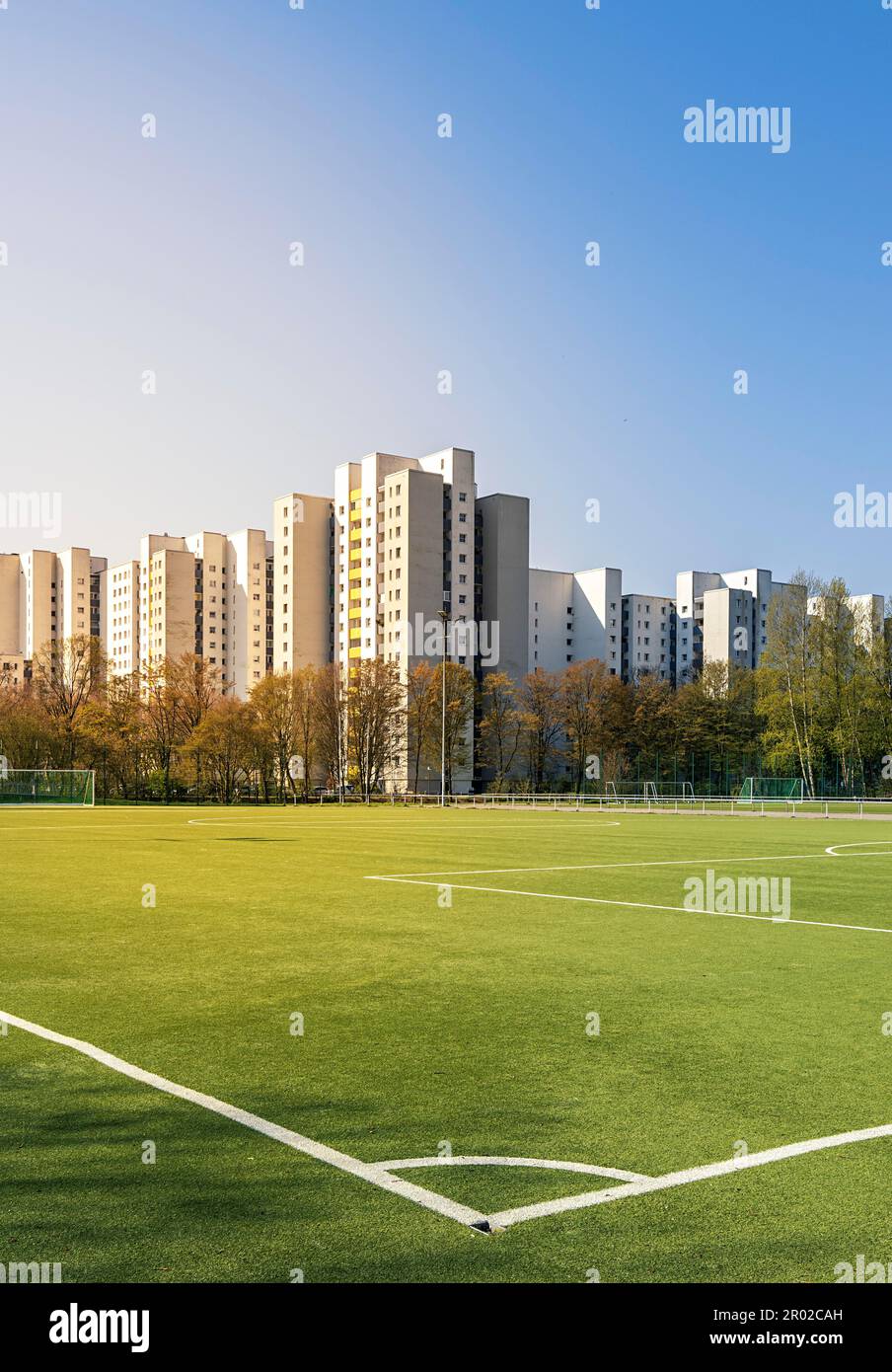 Football field and high-rise buildings in the Maerkisches Viertel ...