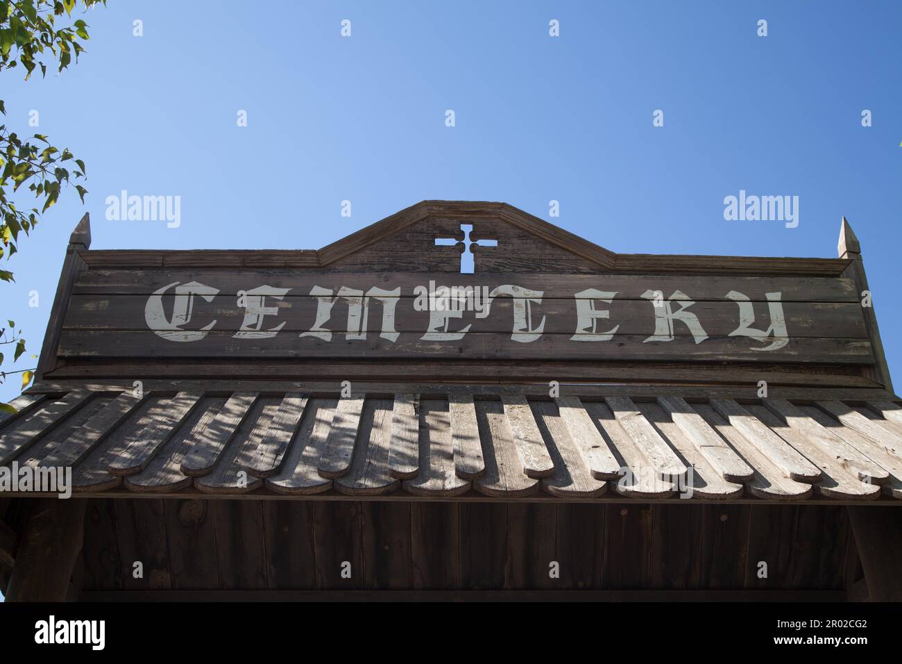 Vintage cemetery entrance made of wood Stock Photo - Alamy