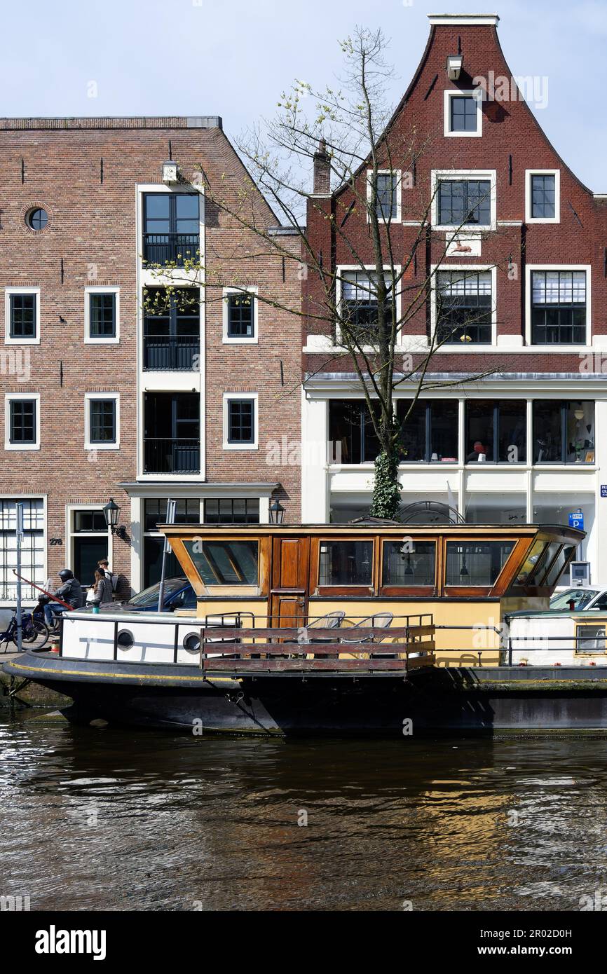 Traditional Amsterdam scene with old architecture typicla buildings and ...