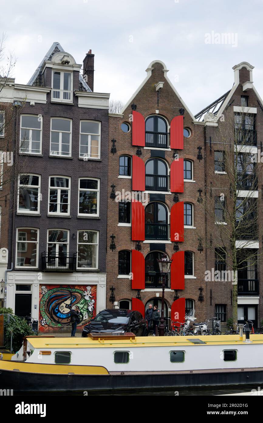 Traditional Amsterdam scene with old architecture typicla buildings and ...