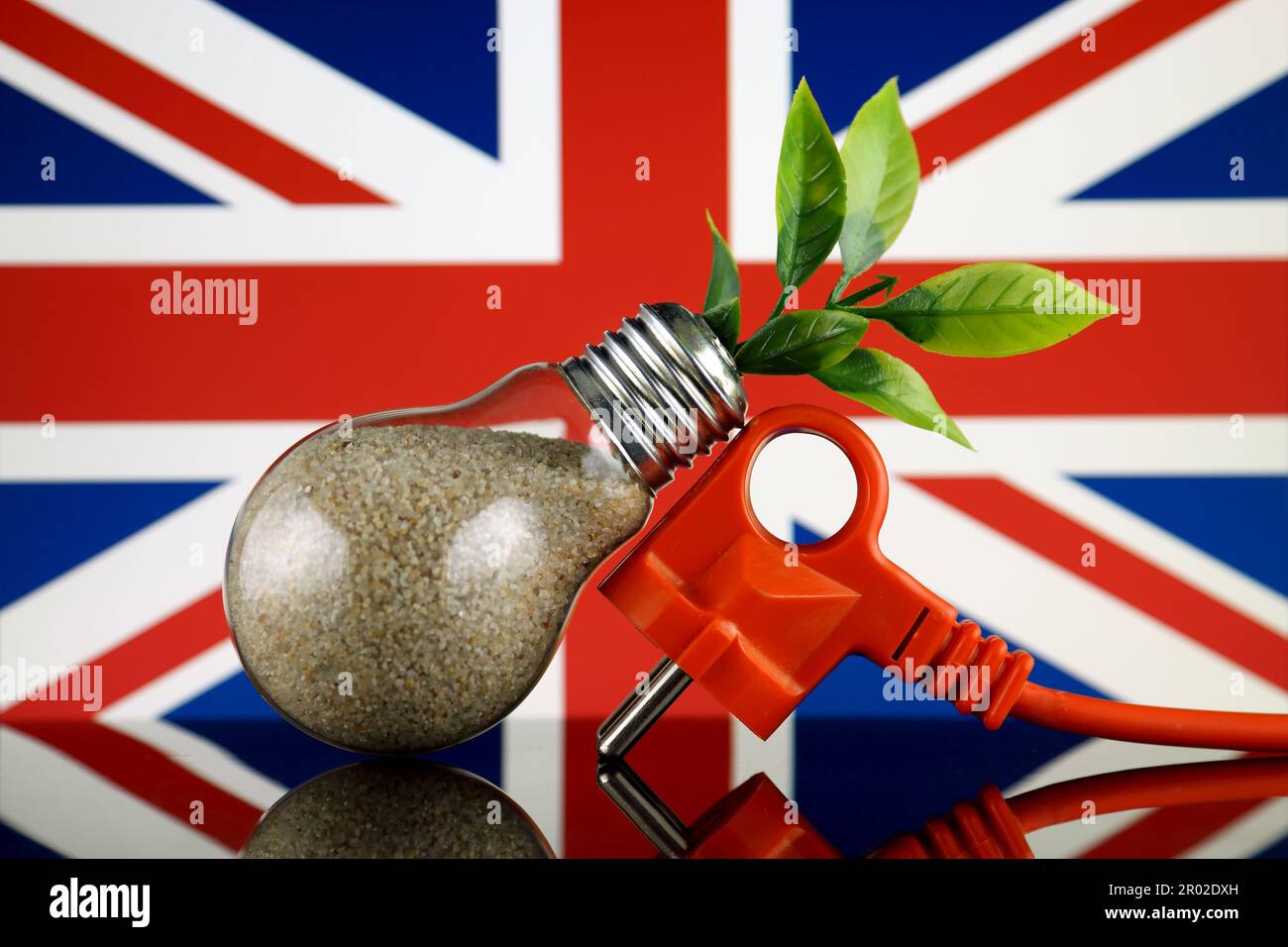 Plug, plant growing inside the light bulb and United Kingdom Flag ...