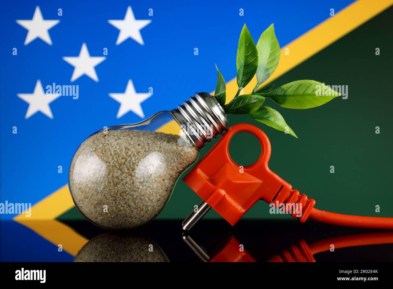 Plug, plant growing inside the light bulb and Solomon Islands Flag ...