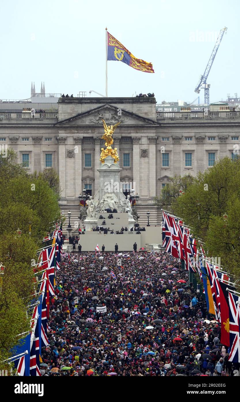 Member of the public along The Mall following the coronation ceremony ...