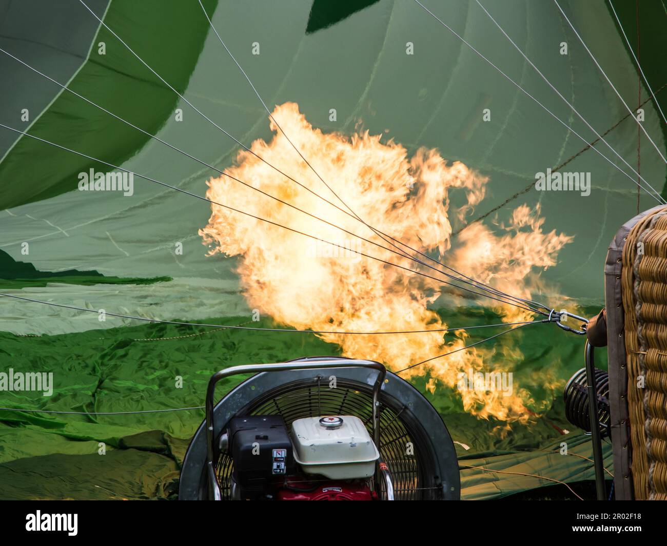Filling up a hot air balloon with a gas burner Stock Photo - Alamy