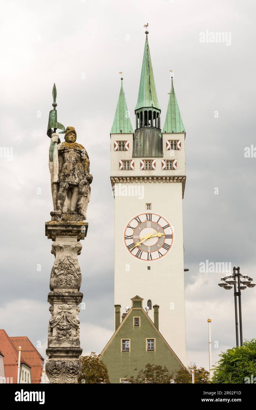Historic tower (called Stadtturm) of Straubing and a sculpture of the ...