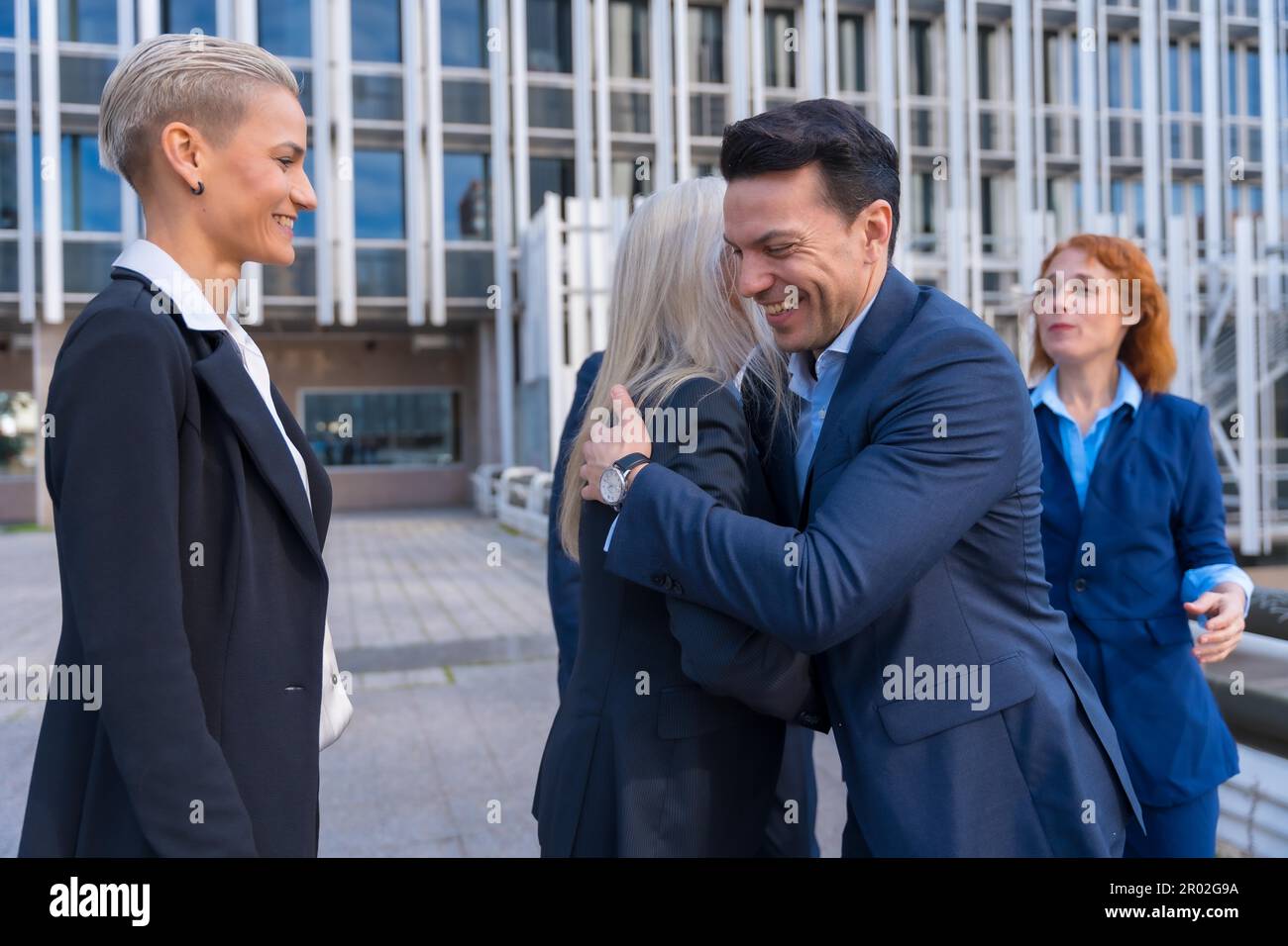 Successful Business Executives Congratulating Each Other in Corporate ...