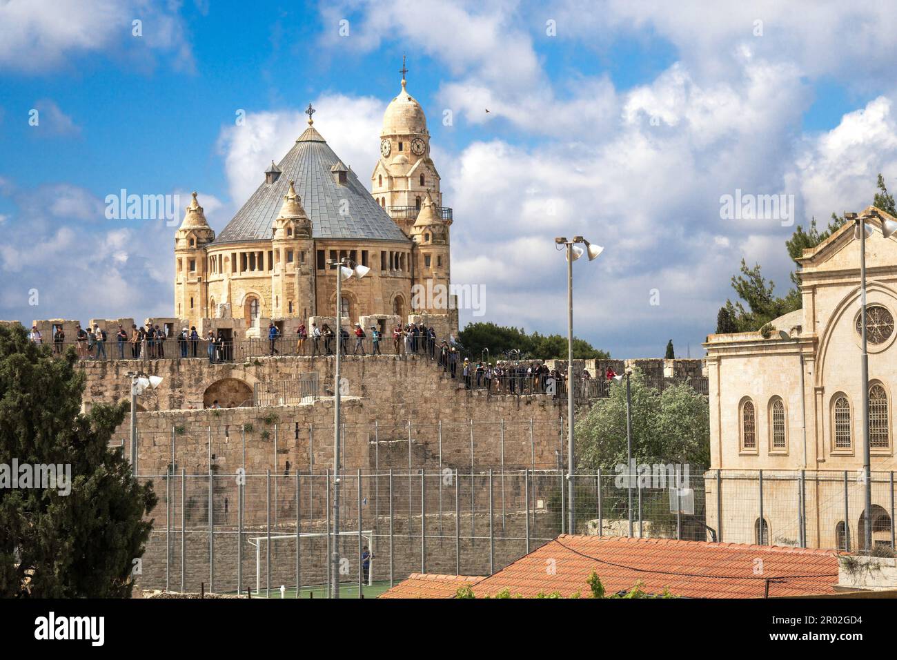 View of Jerusalem Dormition Abbey church at mount Sion with croud of ...