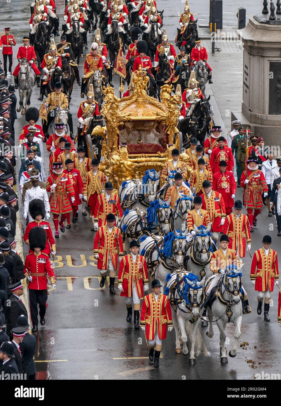 King Charles III and Queen Camilla are carried in the Gold State Coach ...