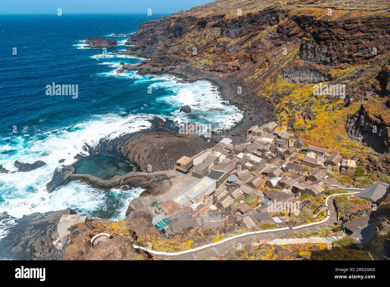 View from above of the fishing village of Pozo de las Calcosas on the ...