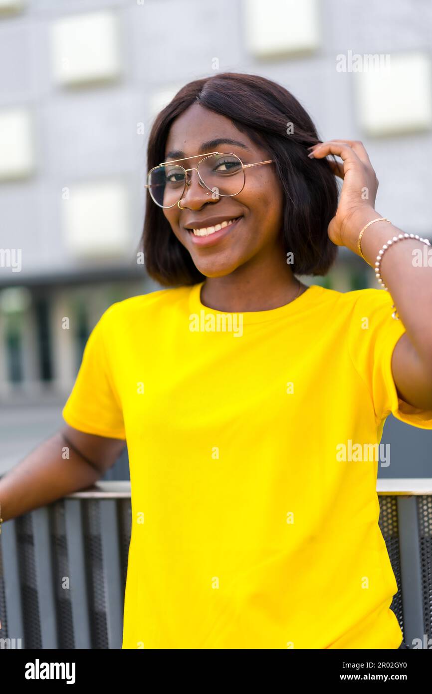 Street Smart Style: A Fashion-Forward Black Woman Wears Yellow with ...