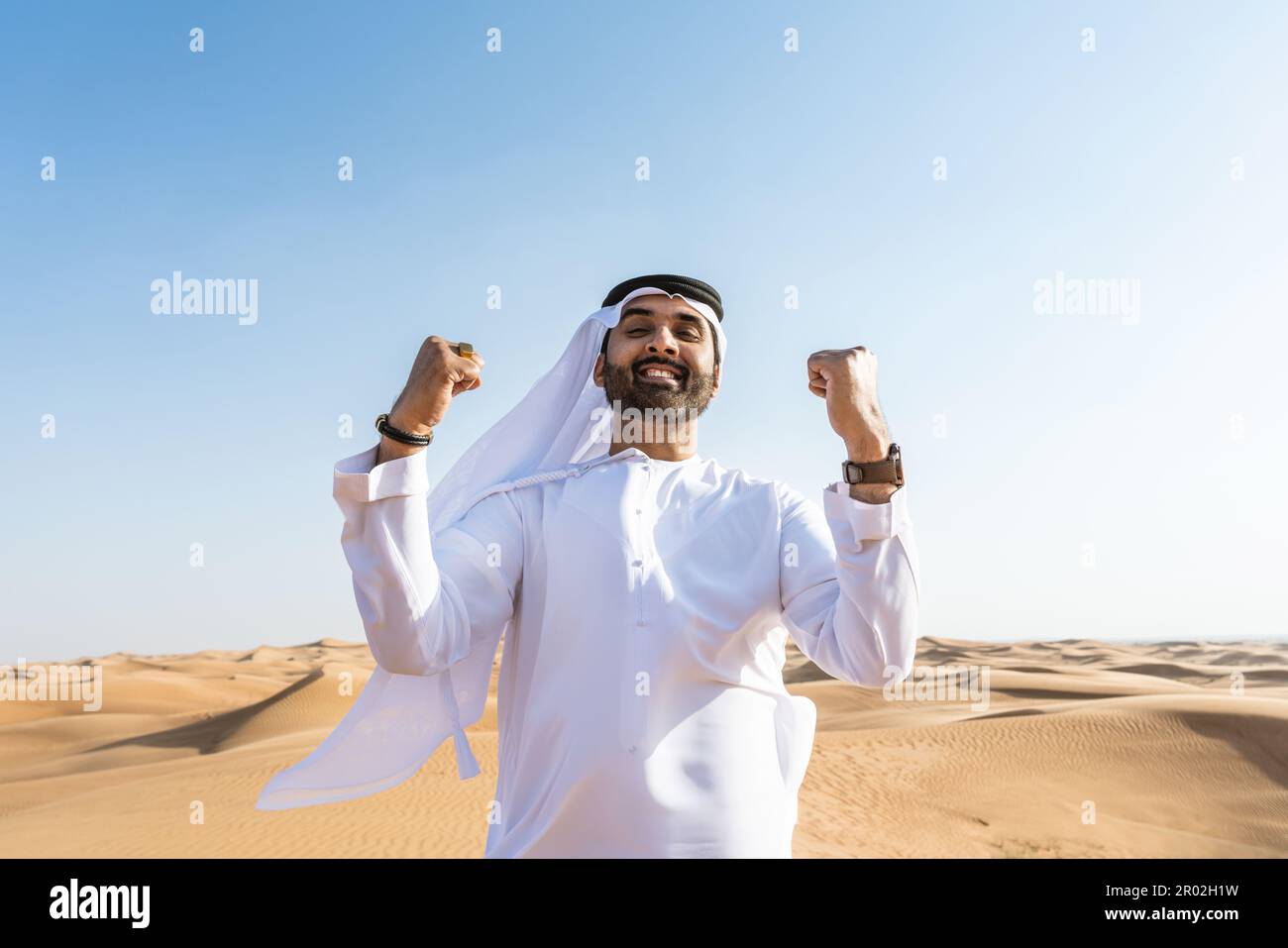 Handsome and successful middle-eastern man wearing traditional emirati ...
